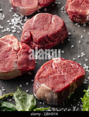 Fillet Mignon tenderloin raw meat veal and beef steaks set, on wooden ...