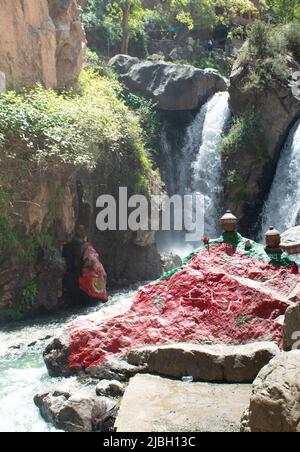 Marrakesh waterfall tourist destination with welcome writting mountain ...
