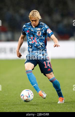 Junya Itō #14 of Japan national team runs for the ball during the FIFA ...