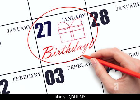27th day of January. The hand circles the date on the calendar 27 ...