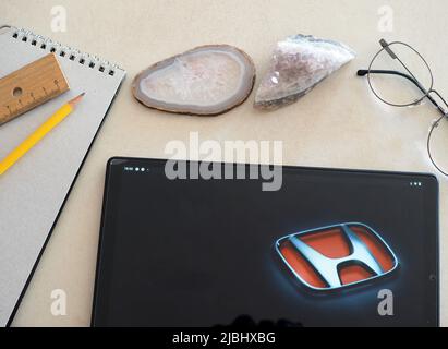 In this photo illustration Honda Motor Co., Ltd. logo seen displayed on ...