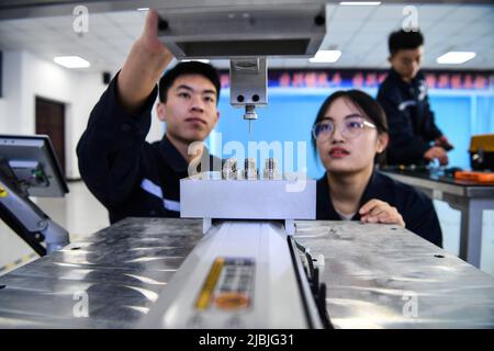 LUZHOU, CHINA - JUNE 3, 2022 - Teachers guide a team of the Luzhou ...