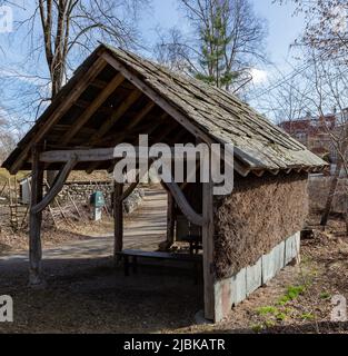 A historic stave house with a cladding made from juniper branches at ...