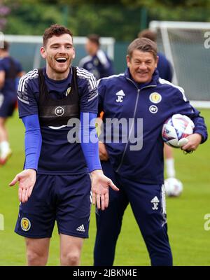 Scotland's Andrew Robertson (right) with coach Steven Naismith during ...