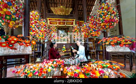 Hue City, Vietnam - April 27, 2022: Hue girl in traditional dress at a ...