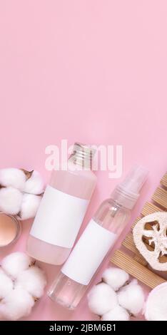 cotton pads bottles and towel Stock Photo - Alamy