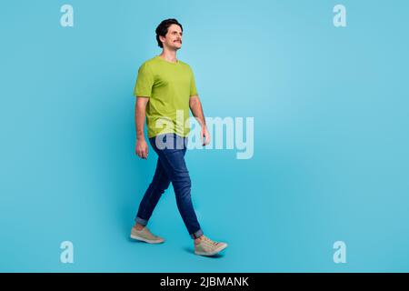 Full length photo of dreamy pretty lady wear green sweater walking ...