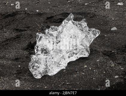 The remains of ice floes on the shoreline at Diamond Beach Iceland ...