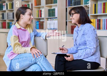 Psychologist, high school behavior counseling teenage student in ...