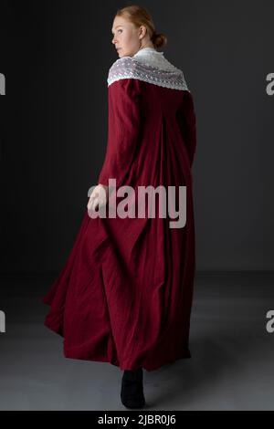 A working class Regency woman wearing a red dress Stock Photo - Alamy