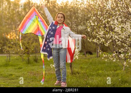 little girl with kite and usa flag Stock Photo - Alamy