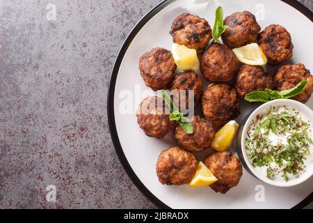 Fried Keftedakia greek veal meatballs served with tzatziki sauce and ...