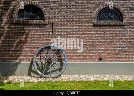 Beemster, Netherlands, May 2022. A traditional farm with old agricultural tools. High quality ...