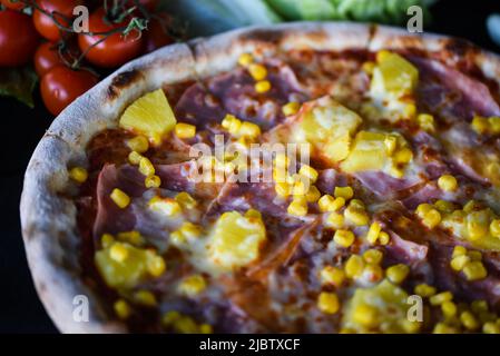 delicious italian Hawaiis pizza with fresh pineapple Stock Photo - Alamy