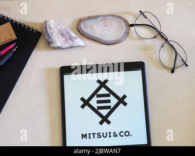 In this photo illustration, MITSUI & CO., LTD logo seen displayed on a ...
