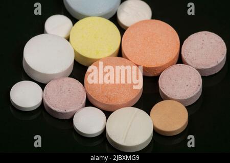 variation of coated tablets for treatment of diseases in a pink ...