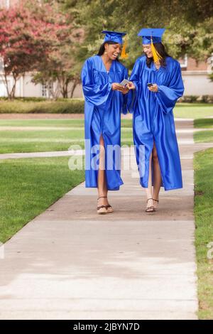 group of happy graduates walking to graduation ceremony Stock Photo - Alamy
