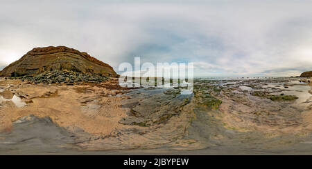 360° view of Searching for fossils on Whitby beach - Alamy