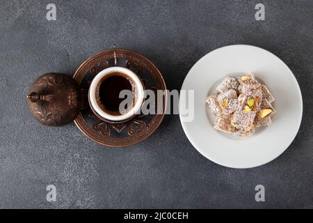 Traditional pistachio Turkish delight and Turkish coffee, top view ...