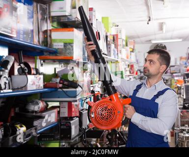 male is choosing windblown Stock Photo - Alamy