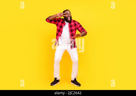 Photo of cool cheerful dreamy afro american woman point finger empty ...