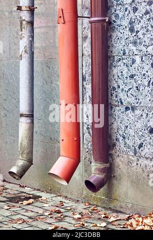 Downspout on the wall of the house close up Stock Photo - Alamy