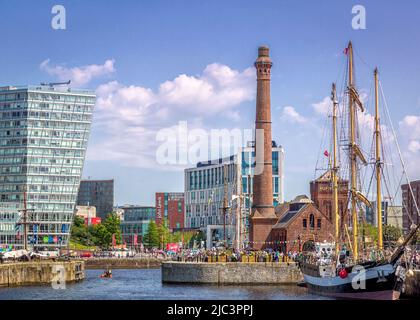 Liverpool docks with Pumphouse and tall ships view Stock Photo - Alamy