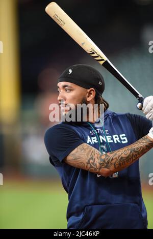 Seattle Mariners shortstop J.P. Crawford reaches to catch a pop fly ...