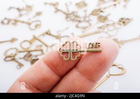 Retro style metal keys on a white background Stock Photo - Alamy