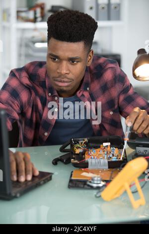professional man repairing and assembling a computer Stock Photo - Alamy