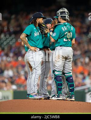 Seattle Mariners catcher Cal Raleigh celebrates in the locker room ...
