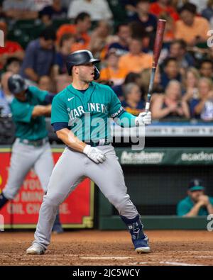 Seattle Mariners' Ty France (23) is congratulated in the dugout after ...
