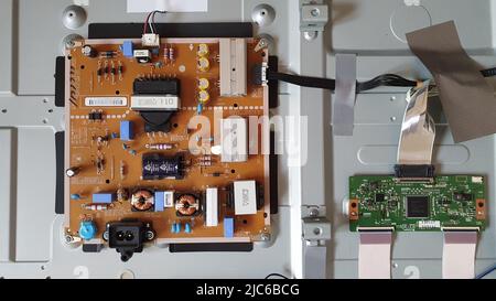 Inside of a TV remote control circuit board Stock Photo - Alamy