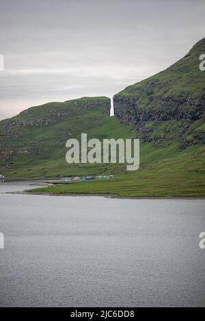 Leitisvatn lake and Bosdalafossur waterfall on Vagar island aerial view ...