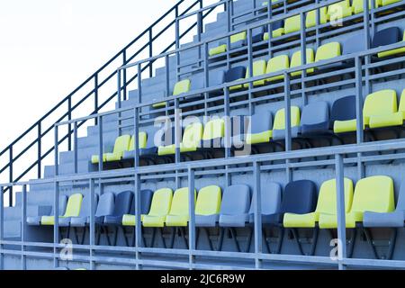 Baseball fans sit in social distance squares during a spring training ...