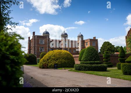 Doddington Hall is, from the outside, an Elizabethan prodigy house or ...