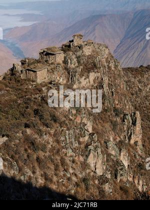 Ruins of the stone citadel of Rupac in the Peruvian Andes. The ...