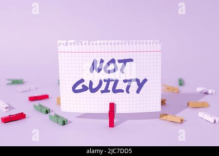 Handwriting text Not Guilty. Business approach someone is innocent ...