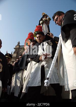 Devotees carrying the religious litter of Saint Rose of Lima, the ...