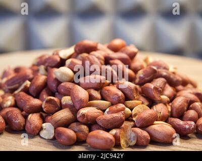 Heap of roasted peanuts, side view. Peanuts macro. Nuts. Peanuts peeled ...
