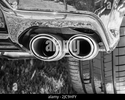 Rear view double pipe exhaust system exhaust pipes of sports car racing ...