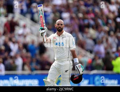 Daryl Mitchell of New Zealand is hit with a ball off Jofra Archer of ...
