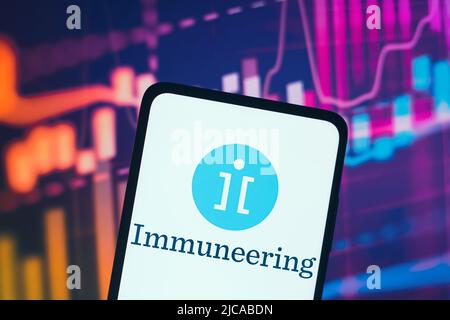 In this photo illustration, the Immuneering Corporation logo seen ...