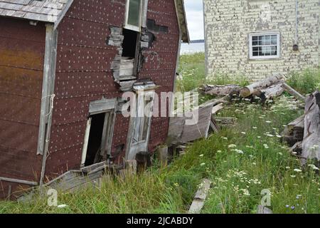 Window and yellow siding at old seaside building Stock Photo - Alamy