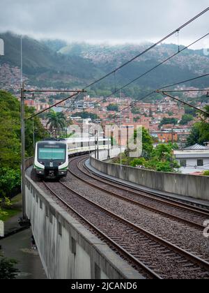 A Metro Rail Transit Line 3 passes by EDSA highway in Quezon city ...
