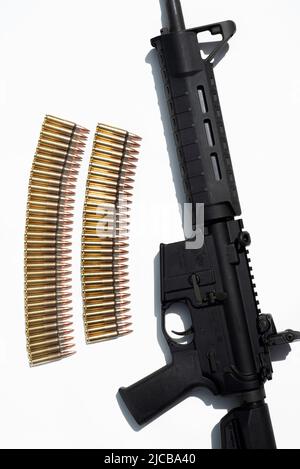 An AR-15 type rifle (without a magazine) and 60-rounds of 5.56mm ammo ...