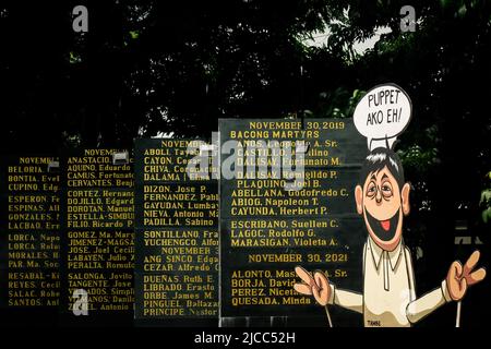 Incoming Philippine president Ferdinand Marcos Jr., left, and outgoing ...