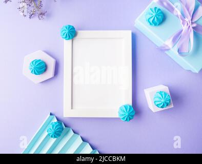 White empty frame on purple background with blue sweet decor Stock ...