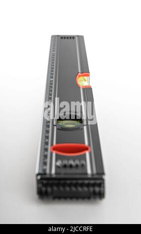 Magnetic building level isolated on white Stock Photo - Alamy