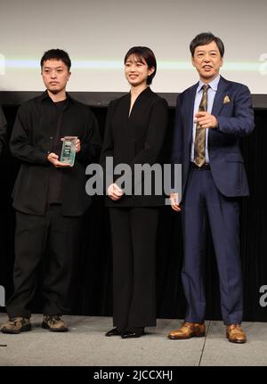 (L-R) Japanese film director Kensaku Kakimoto, Japanese actress Yuumi ...